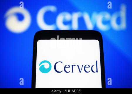 In this photo illustration, a Cerved Group logo is seen on a smartphone ...