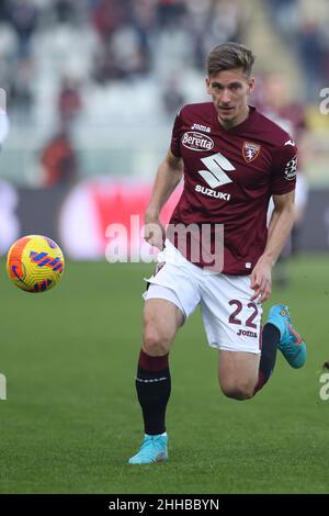 Turin, Italy, 23rd January 2022. Mergim Vojvoda of Torino FC challenges ...