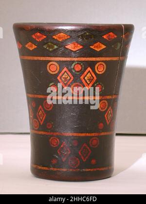 This Kero, a traditional Andean drinking vessel, is an example of ...