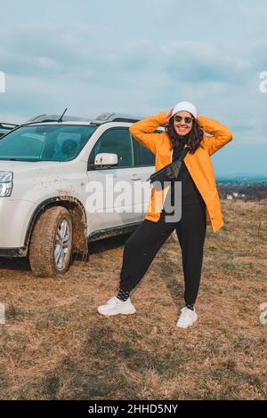 Friends in front of off road vehicle, Kennedy Meadows, California, US ...