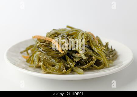 Seaweed stems on a white background Stock Photo - Alamy
