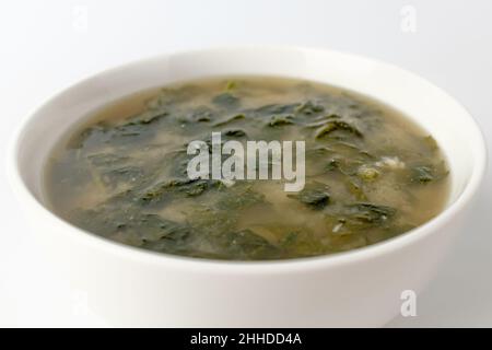 Mallow miso soup on a white background Stock Photo - Alamy