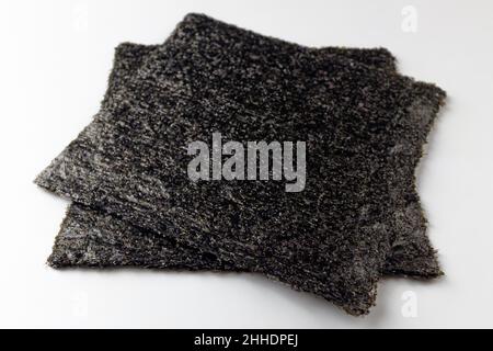 Square seaweed on white background Stock Photo - Alamy