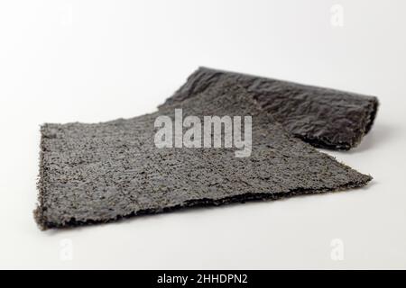 Square seaweed on white background Stock Photo - Alamy