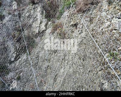 Acier iron Metallic net for rocks falling protection Stock Photo - Alamy