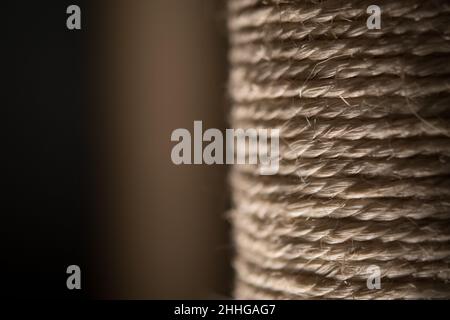 A rope wrapped around a pole. The texture of the rope Stock Photo - Alamy