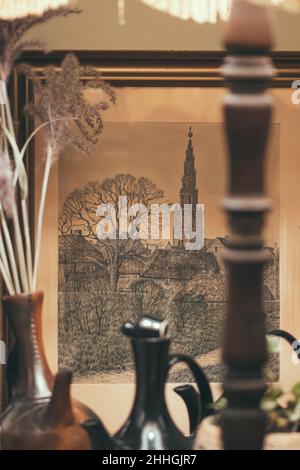 A painting depicting the interior of a print shop, showing the busy ...