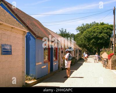The Avenue, Sark's main street with shops and tourists in The Village ...