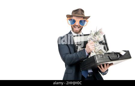 Money makes the man. Happy showman hold suitcase with money. Rich ...