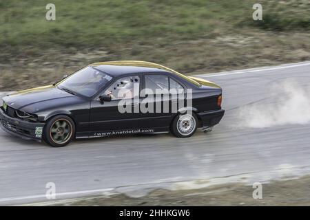 Modified BMW E36 racing on the road during a competition in Barcelona ...