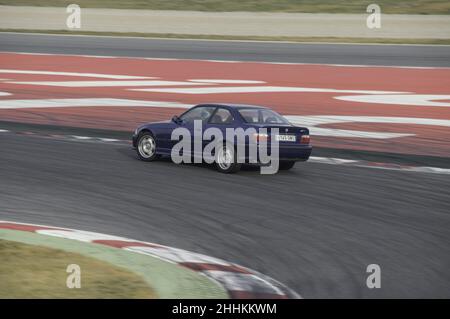 Modified BMW E36 racing on the road during a competition in Barcelona ...