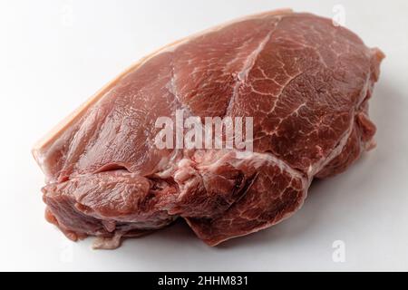 Pork front leg meat on white background Stock Photo - Alamy