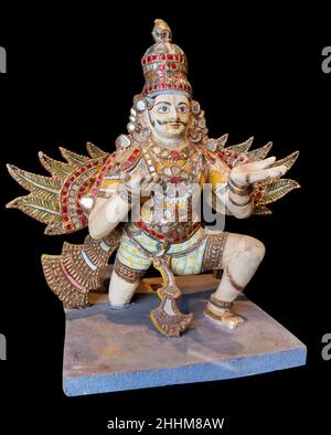 Garuda ancient statue isolated on black background with clipping path ...