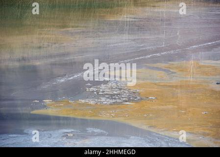 Muddy waters in a decantation pond. Toxic residuals from a copper mine ...