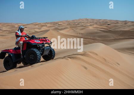 ATV Riding and Dune Bashing on a Desert Safari in Dubai, UAE Stock ...