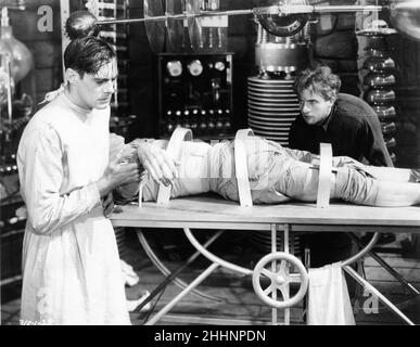 COLIN CLIVE as Henry Frankenstein and BORIS KARLOFF as the Monster in ...