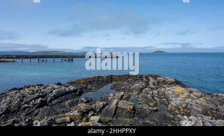 View towards Eriskay Ferry Terminal with a house built on the ...