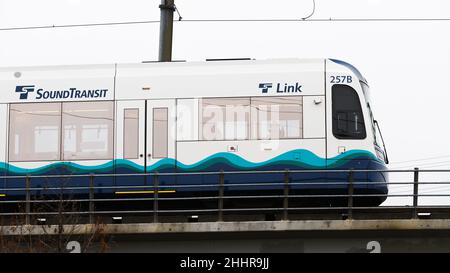 Seattle - January 23, 2022; A Sound Transit link Light Rail train passing through the SODO ...