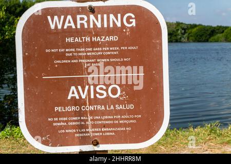 Mercury health warning sign in Florida Stock Photo - Alamy