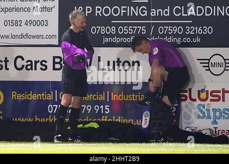 Assistant referee Michael George (left) is replaced for fourth official ...