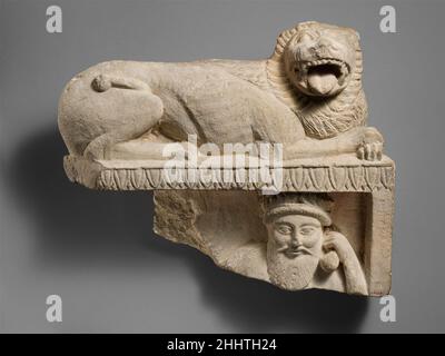This limestone finial is part of a funerary stele, showcasing ...