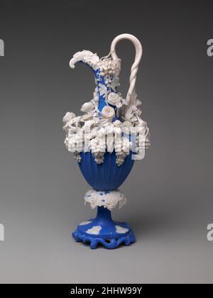 A historic ewer made of pottery or metal, showing craftsmanship and ...