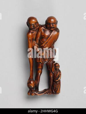 Netsuke of Ashinaga and Tenaga with an Octopus, 18th century Stock ...