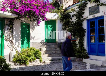 Traditional alley in Sigri village, Lesvos island. Coloured doors and ...