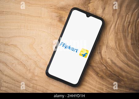 Flipkart app on a device screen with a yellow logo and details about ...