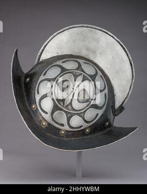 This 16th-century Morion helmet has a high crest and wide brim ...