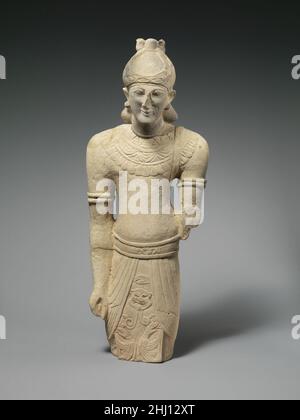 Male figure wears an Egyptian kilt a falcon mask wig 6th century B.C ...