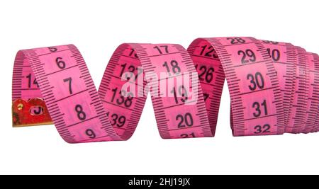 Pink rubber tape measure for sewing cloth or fabric isolated on the white Stock Photo - Alamy