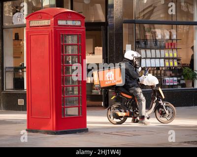 Just eat, delivery rider on Eskuta micro-mobility electric assisted ...