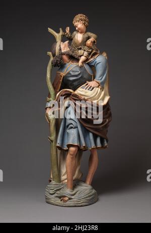 A representation of Saint Christopher carrying the Christ Child across ...