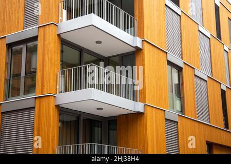 Mannheim, Germany: Modern apartment building with wooden panels Stock ...