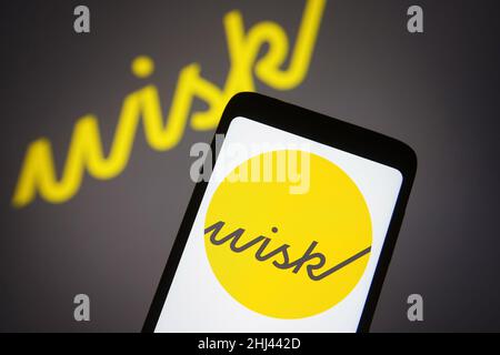 In this photo illustration, the Wisk Aero logo is seen displayed on a ...