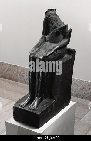 A statue of the female pharaoh Hatshepsut depicted with a false beard ...