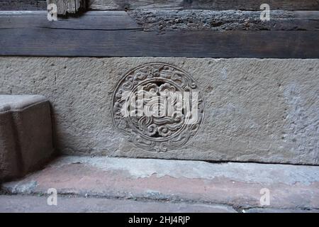 Stonework swastika - Yin Yu Tang House Stock Photo - Alamy