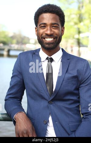 Portrait of a beautiful business man outside Stock Photo - Alamy