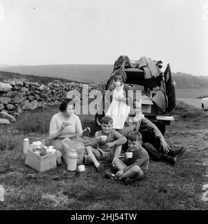 Mr and Mrs Geoffrey Bonnett of Ely, Cambridgeshire, stop for a picnic ...