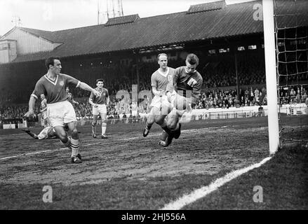 Nottingham Forest goalkeeper Peter Grummitt is challenged by Chelsea ...