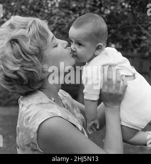 Sylvia Syms, actor and star of Ice Cold In Alex, with her adopted son ...