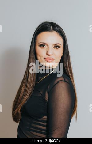 Closeup shot of a young caucasian female posing with a leaf Stock Photo ...
