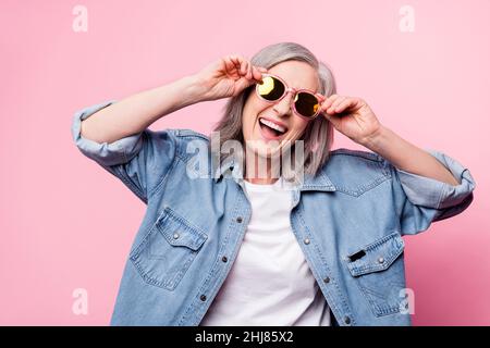 Photo of hooray young lady hold disco ball wear floral top pants ...
