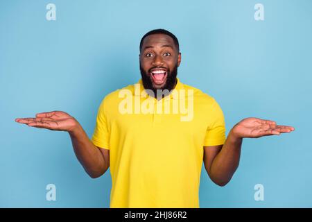 Photo of sweet excited dark skin man wear yellow t-shirt smiling ...