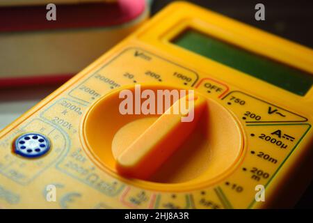 A small digital micrometer. A multimeter is an electronic measuring ...