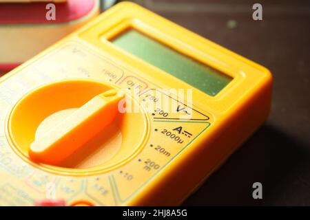 A small digital micrometer. A multimeter is an electronic measuring ...
