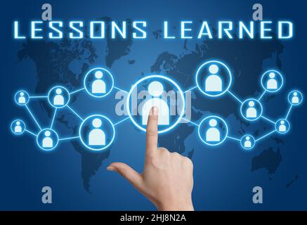 Lessons learned - text concept on blue background with world map and ...