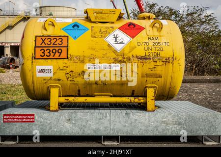 A hazmat container transport vessel for a liquid, water-reactive ...