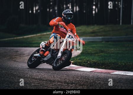 05-09-2020 Riga, Latvia Man on a motorbike on the road riding. having ...